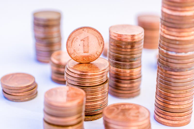 Stacked Coins in Front of White Background Stock Image - Image of ...