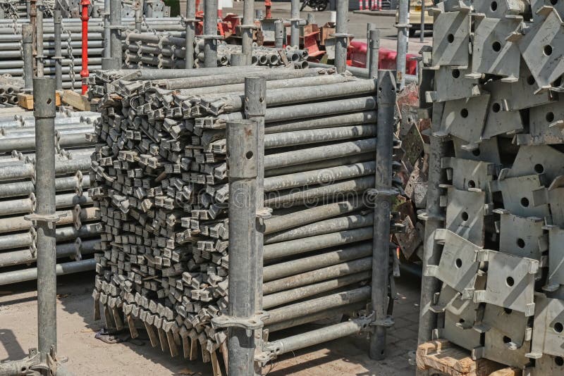 Stacked Construction Struts on Construction Site.Palette with Gray ...