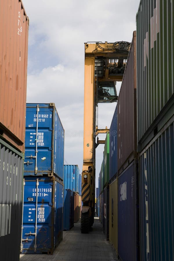 Stacked Containers and Crane in Stockyard Stock Photo - Image of ...