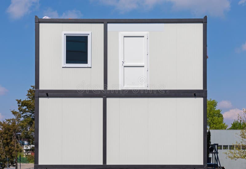 Stacked Containers Office stock photo. Image of cargo - 194750928