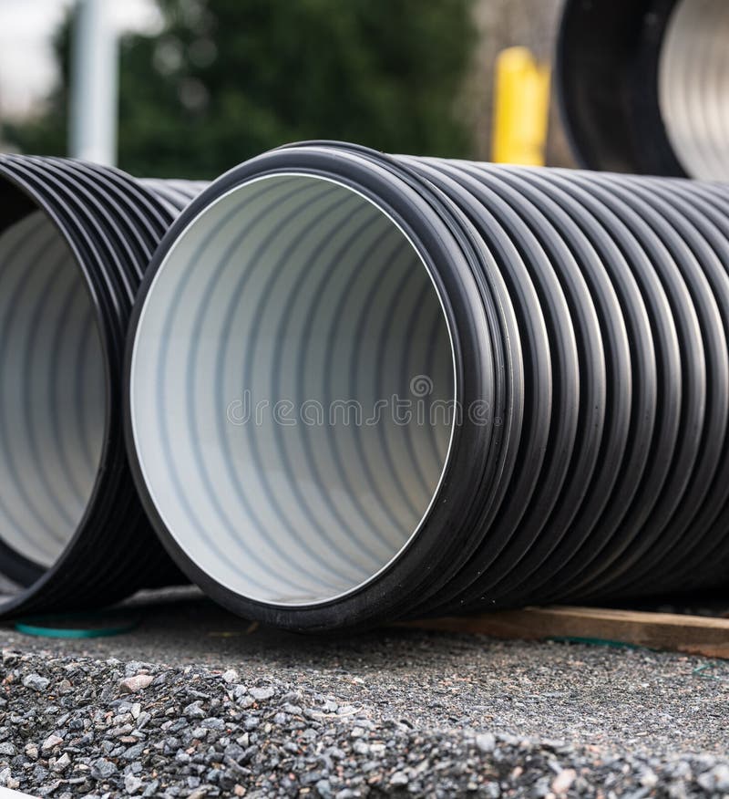 Stacked Corrugated Pipes for Construction Use.. Stock Image - Image of ...