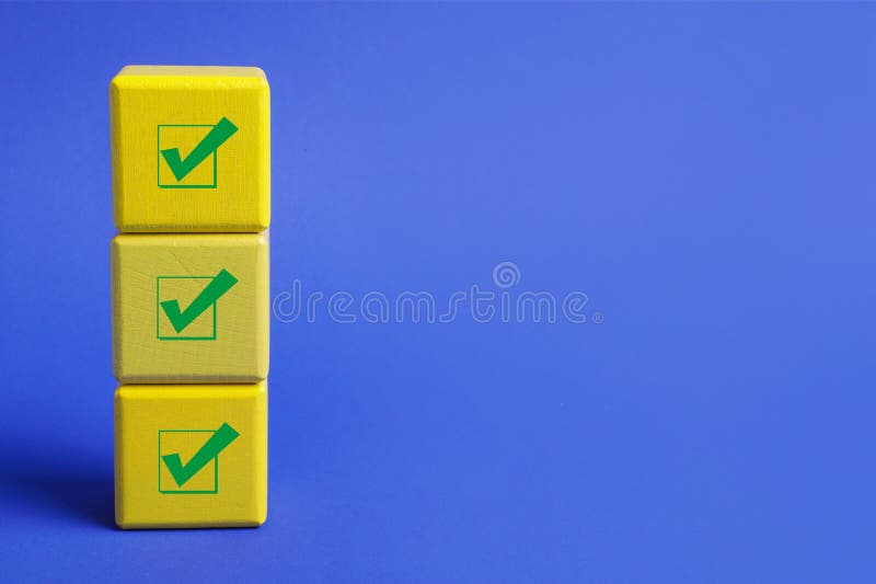 Stacked Cubes with Check Marks on Blue Background. Space for Text Stock ...