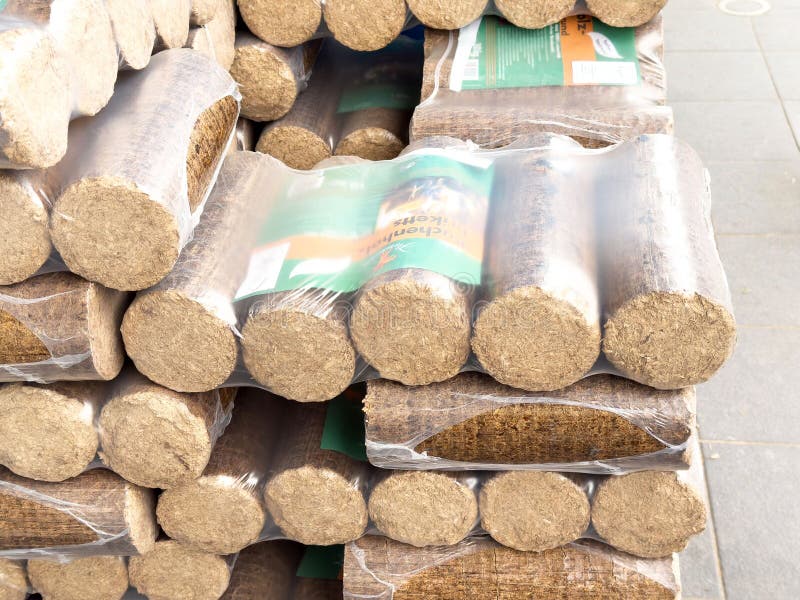 Stacked Eco-friendly Wood Briquettes Wrapped in Plastic Packaging for ...