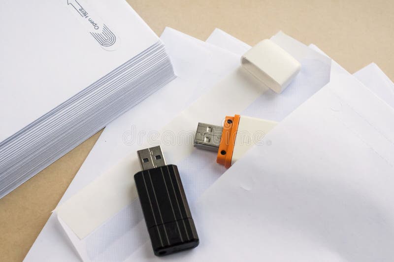 Stacked Envelopes and Flash Drives Stock Photo - Image of stack, flash ...