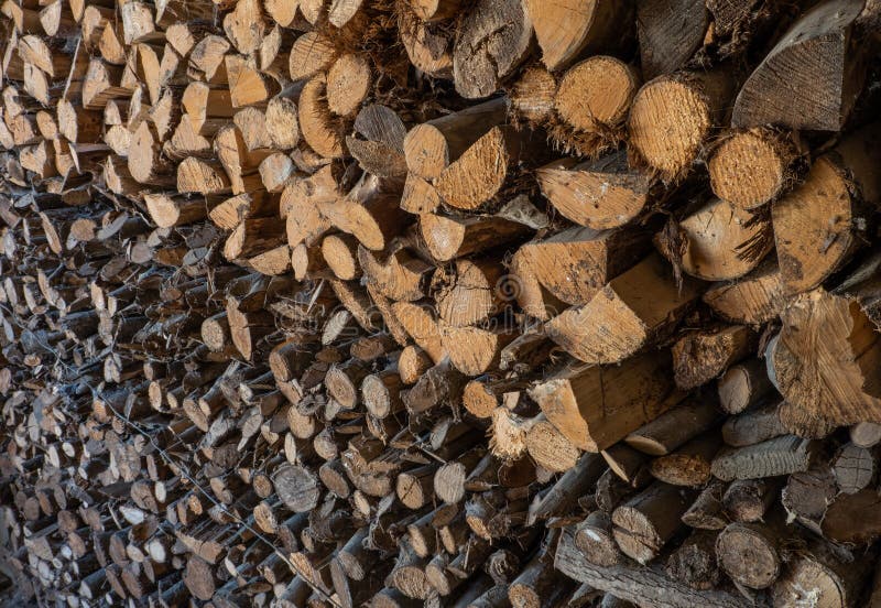 Stacked Firewood of Different Colors and Textures Stock Image - Image ...