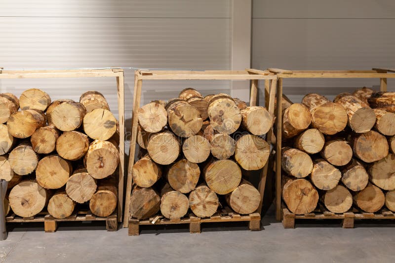 Stacked Firewood Piles Ready for Winter in a Wooden Storage Rack Stock ...