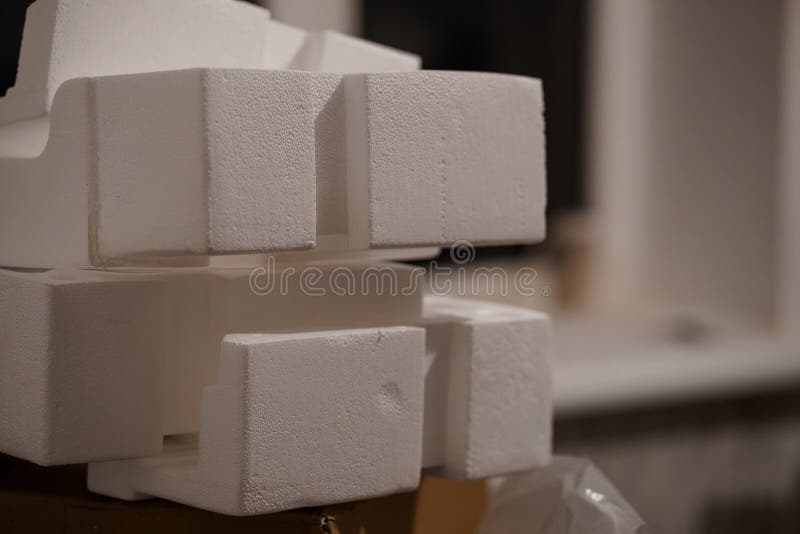 Stacked Foam Packaging Materials with Textured Surfaces in Front of a ...