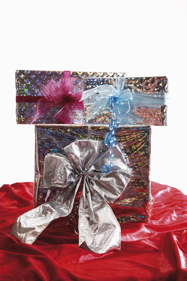 Stacked Gift Parcel on Red Velvet Stock Photo - Image of package ...
