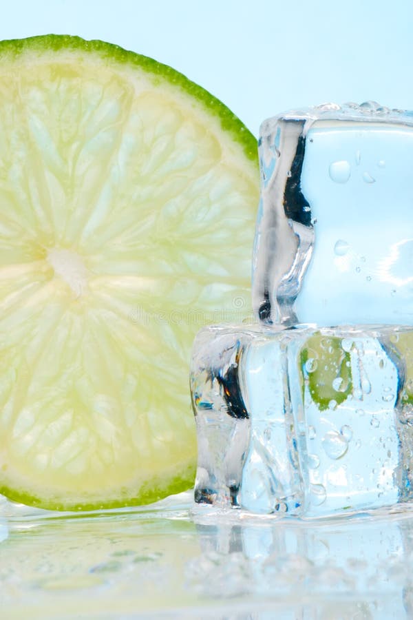 Stacked ice cubes and lime stock image. Image of cold - 2211817