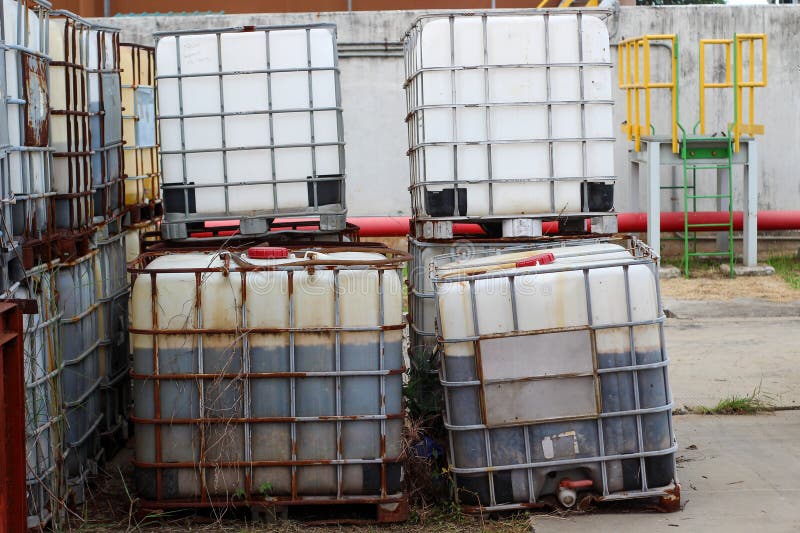 Stacked Intermediate Bulk Containers in an Industrial Setting Showing ...