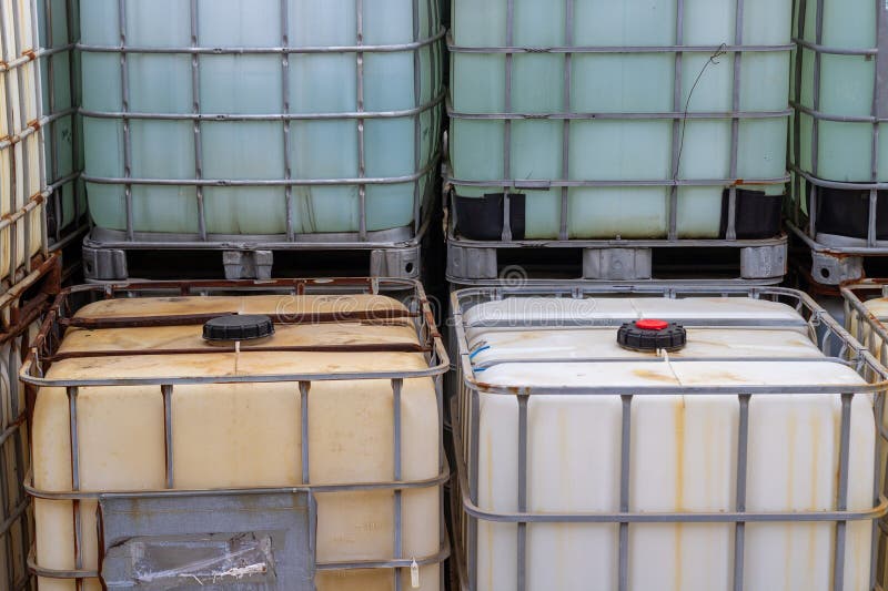 Stacked Intermediate Bulk Containers Showcasing Industrial Liquid ...