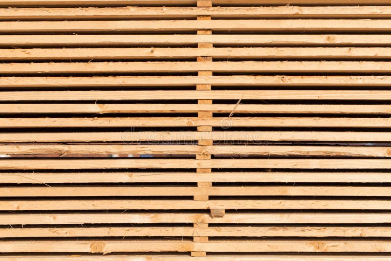 Stacked lumber background stock photo. Image of material - 263673638