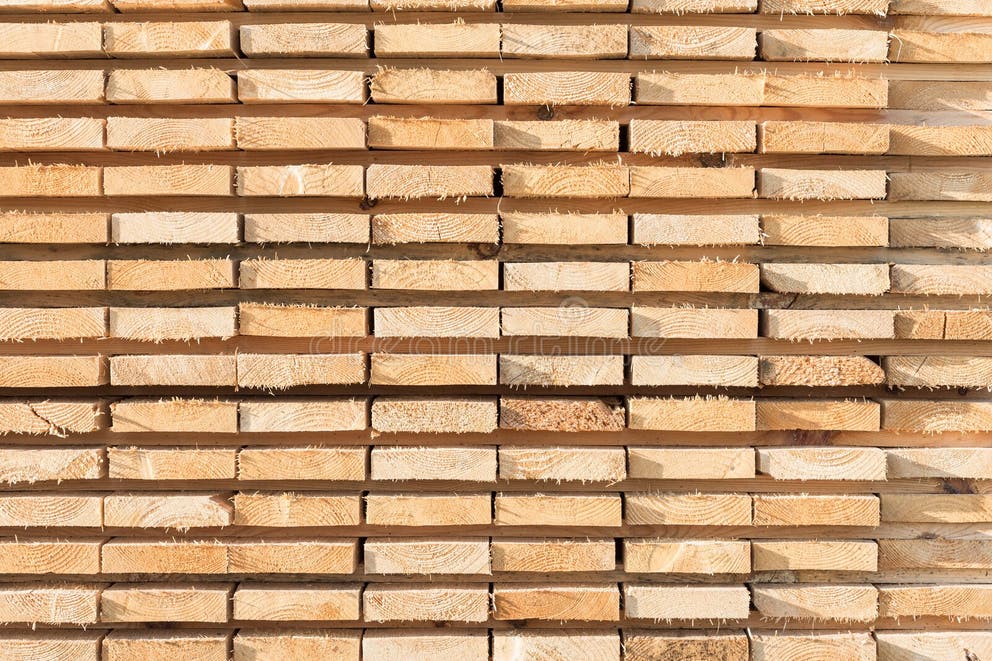 Stacked lumber background stock image. Image of color - 288170127