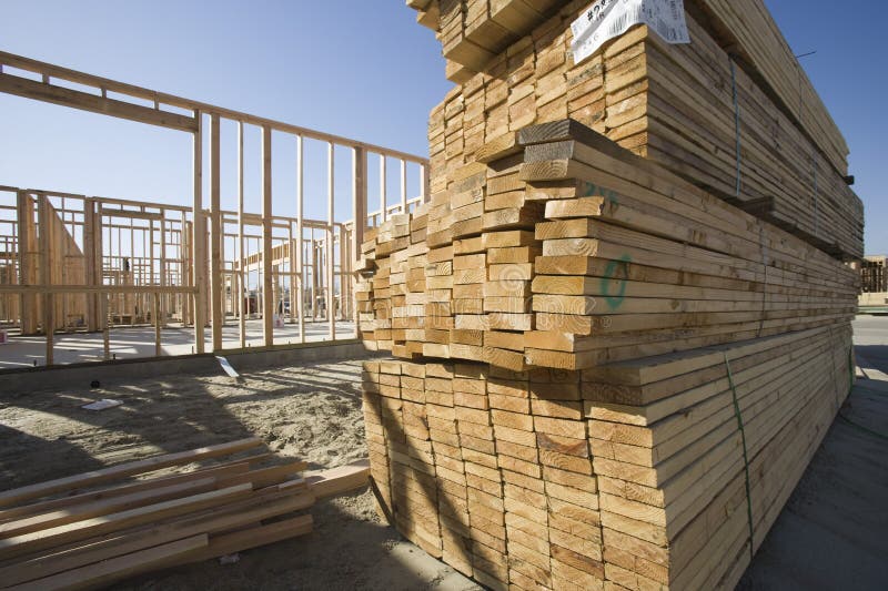 Stacked Lumber at Construction Site Stock Image - Image of site, timber ...