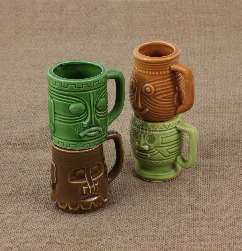 Stacked Miniature Mugs stock image. Image of glazed, designs - 14589021