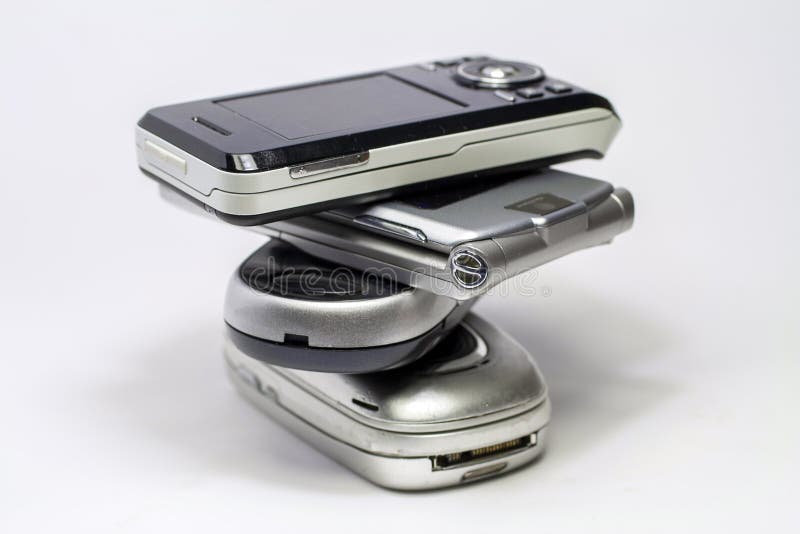 Stacked Old Mobile Phones on White Background Stock Image - Image of ...