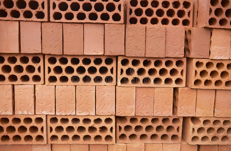 Stacked Orange Bricks for Construction. Close Up Stock Image - Image of ...