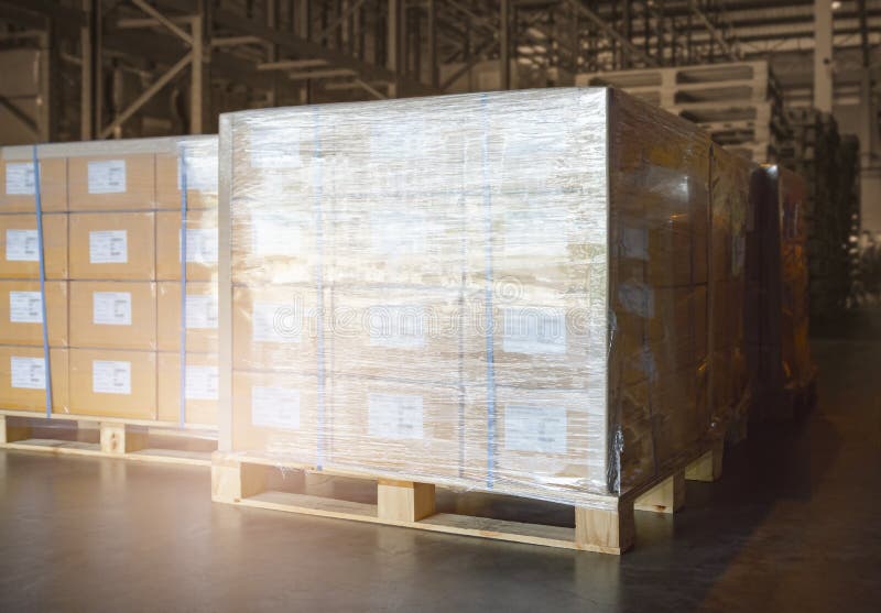 Stacked of Package Boxes Wrapped Plastic Flim on Pallets at Storage ...