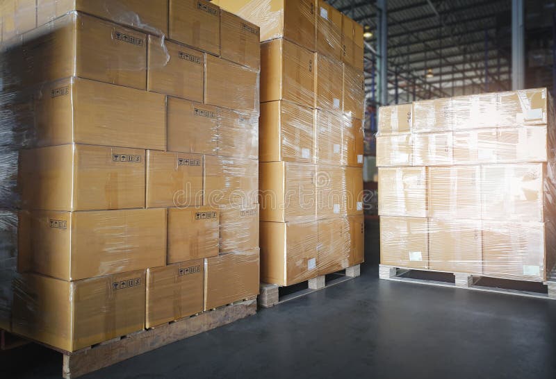 Stacked of Package Boxes Wrapped Plastic Flim on Wooden Pallet at ...