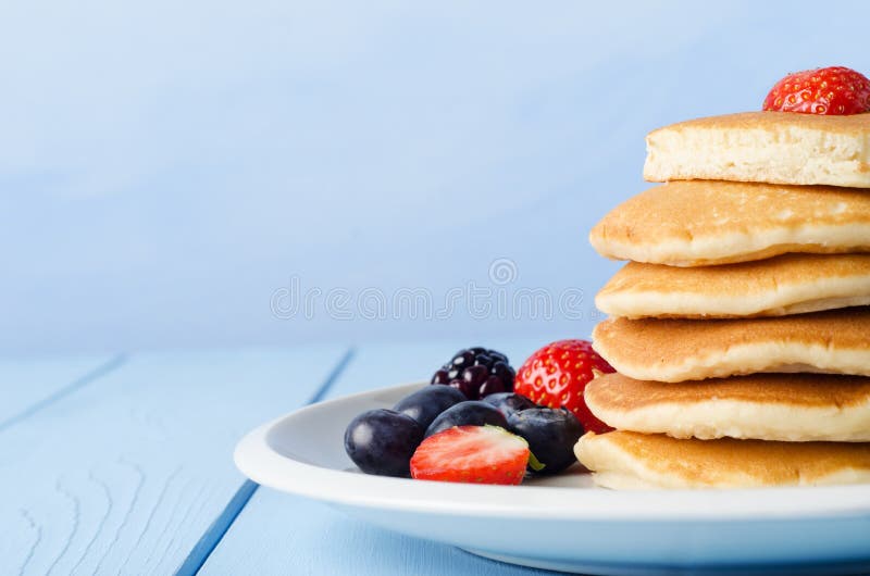 Stacked Pancakes and Fruit stock image. Image of light - 31276517