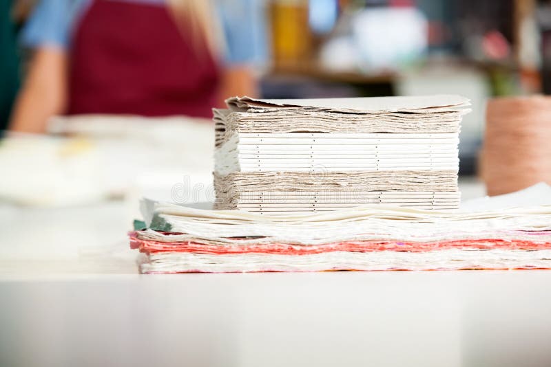 Stacked Papers Ready for Making Notepads on Table Stock Photo - Image ...