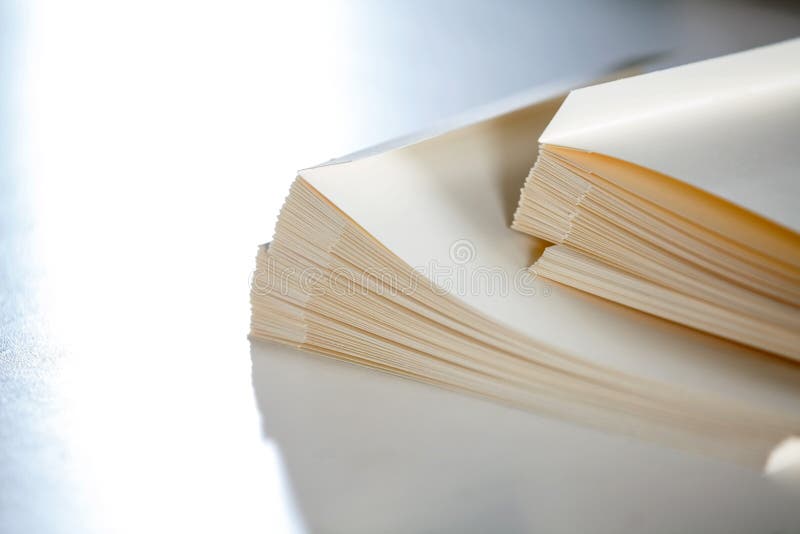 Stacked Papers on Table stock image. Image of binding - 60716869