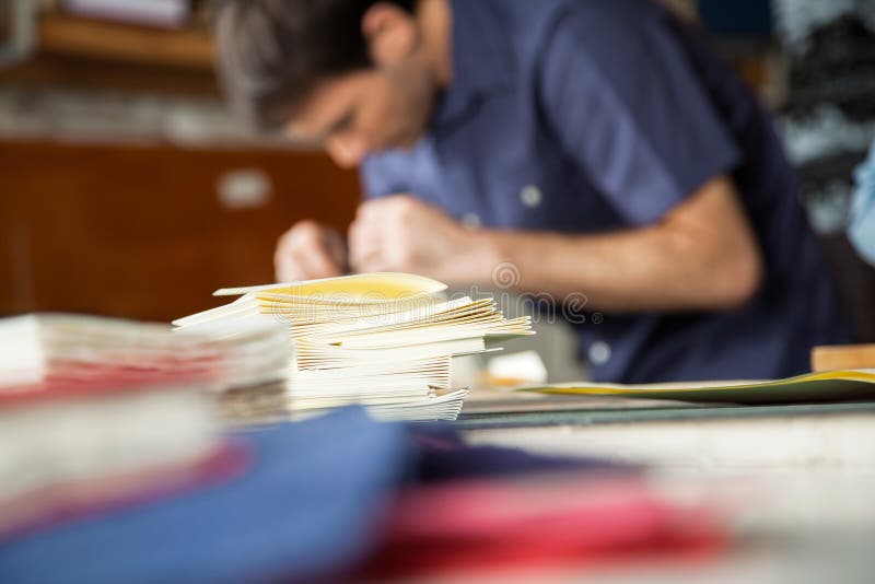 Male and Female Workers Making Papers in Factory Stock Image - Image of ...