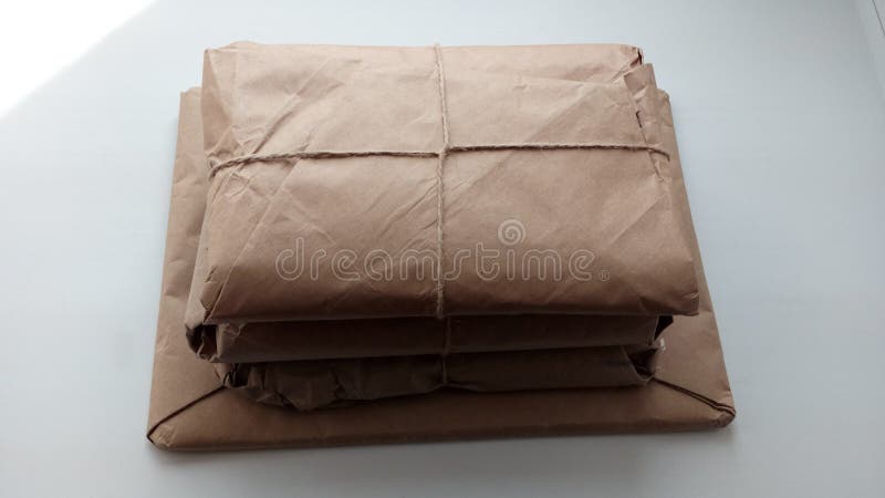 Stacked Parcels Wrapped In Kraft Paper Stock Image - Image of boxes ...