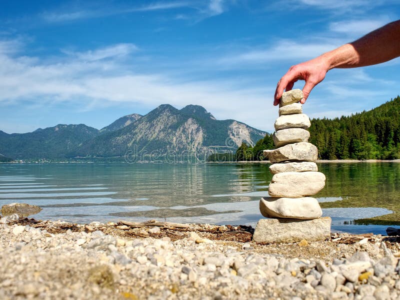Stacked Pebbles on the Lake Shore. Balanced Stones Stack Stock Image ...