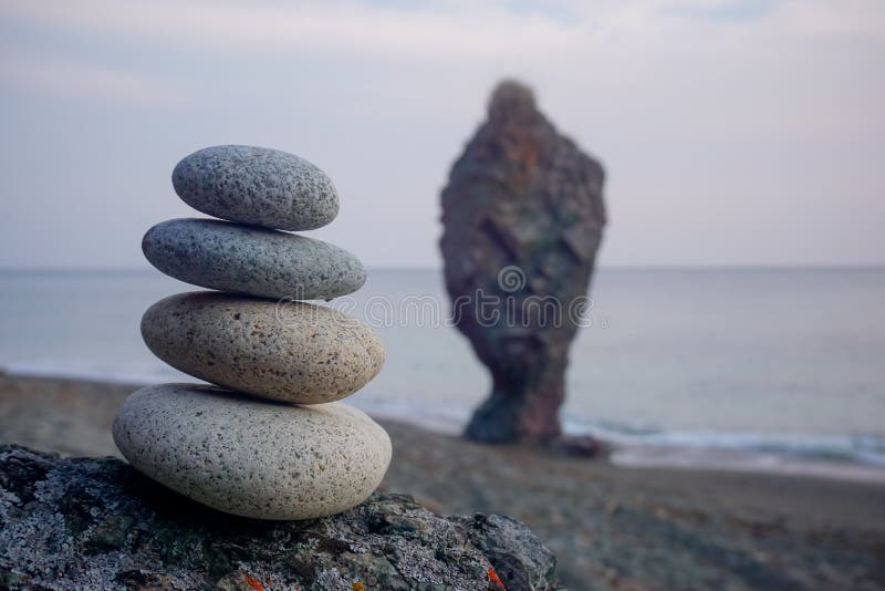 Stacked Pebbles Off the Coast of Cape Giant Stock Photo - Image of ...