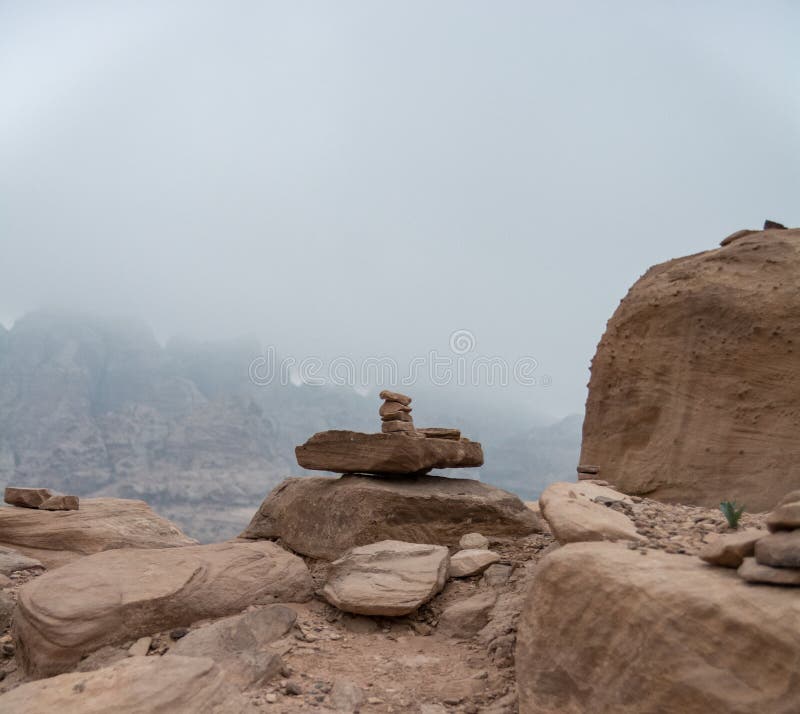 Stacked Pile of Stones and Rocks on Tranquil Desert Background Stock ...