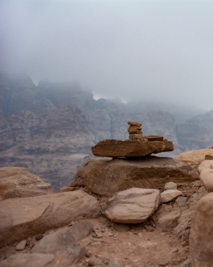 Stacked Pile of Stones and Rocks on Tranquil Desert Background Stock ...