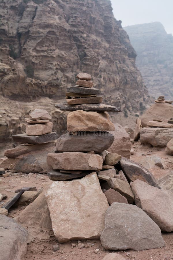 Stacked Pile of Stones and Rocks on Tranquil Desert Background Stock ...