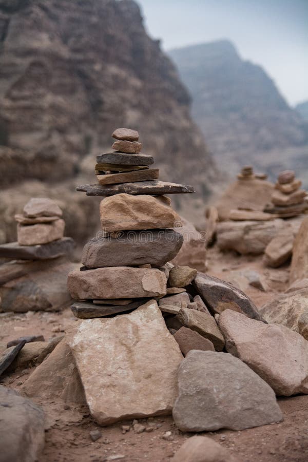 Stacked Pile of Stones and Rocks on Tranquil Desert Background Stock ...
