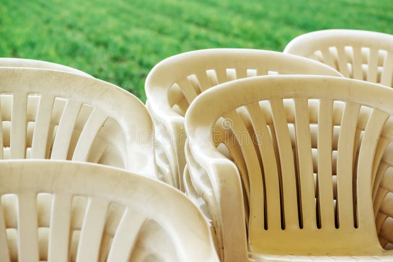 Stacked Red Plastic Chairs In Rows Stock Image - Image of pattern ...