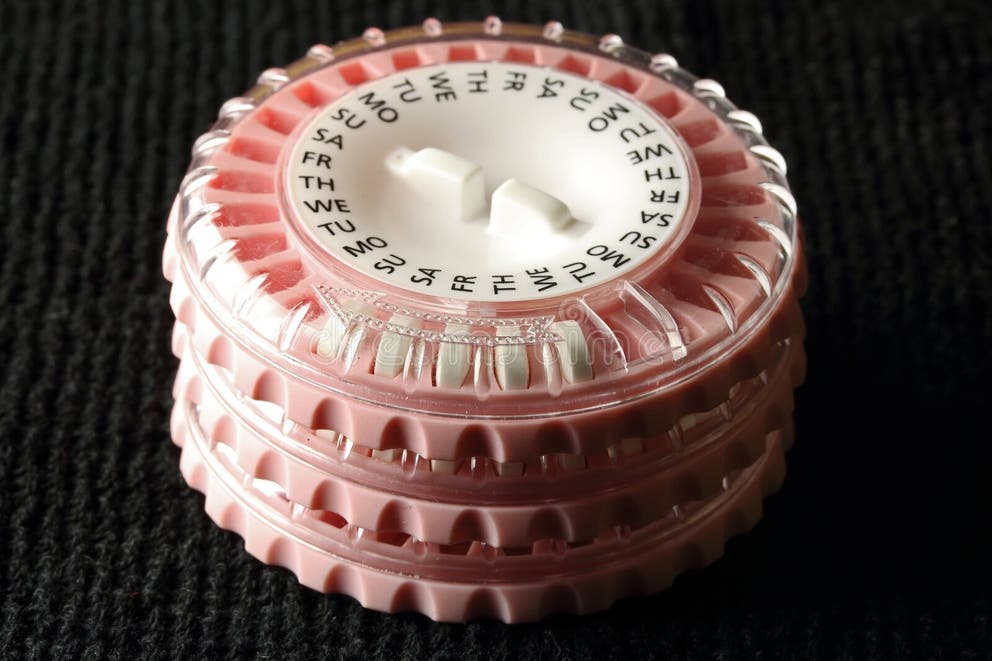 Stacked Plastic Tablet Dispensers Marked in Calender Days for a Month ...