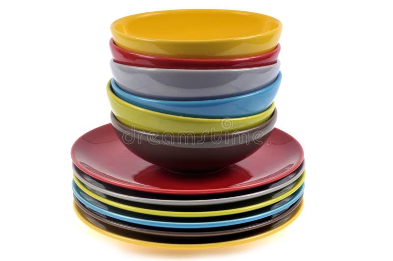 Stacked Plates Of Different Colors On A White Background Stock Photo ...