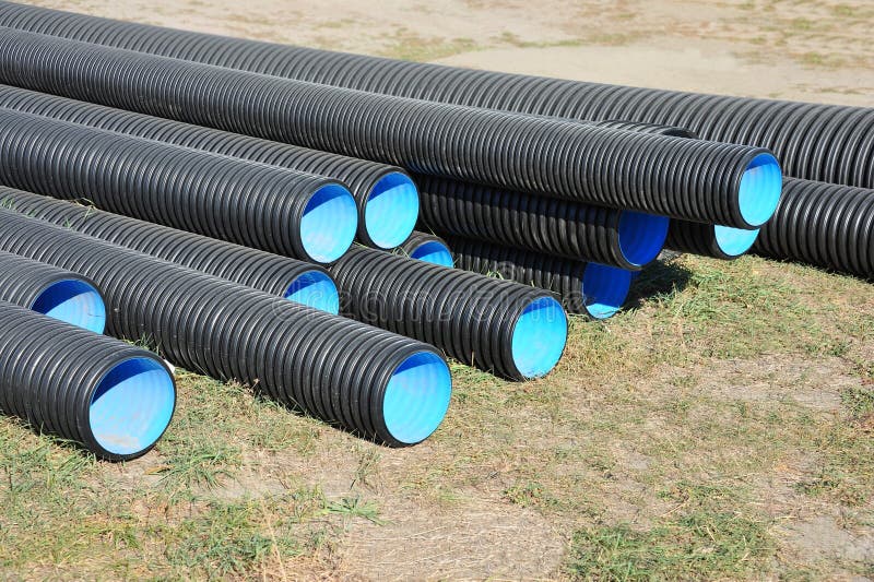 Stacked PVC pipe stock photo. Image of polyvinyl, industrial - 68323530