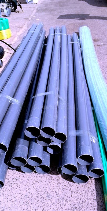 Stacked of pvc pipe stock photo. Image of repair, construction - 297830610