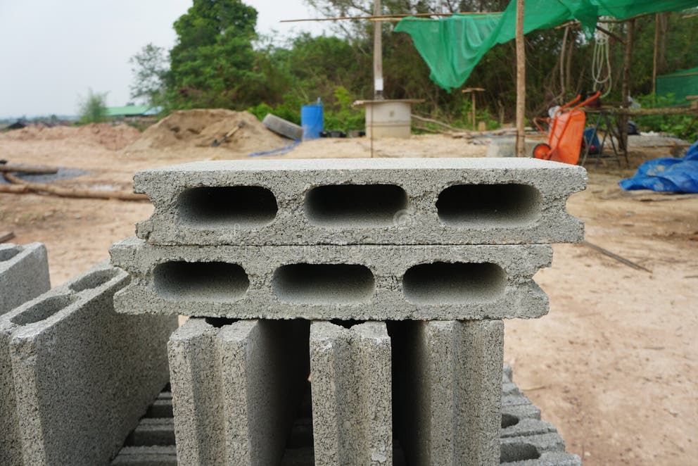 Stacked Rectangular Concrete Blocks on the Construction Site. Building ...