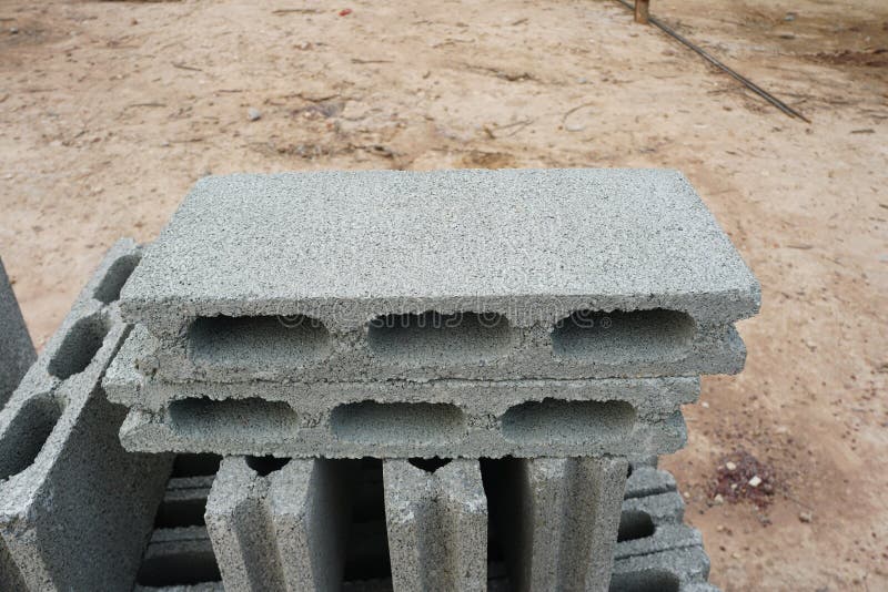 Stacked Rectangular Concrete Blocks on the Construction Site. Building ...