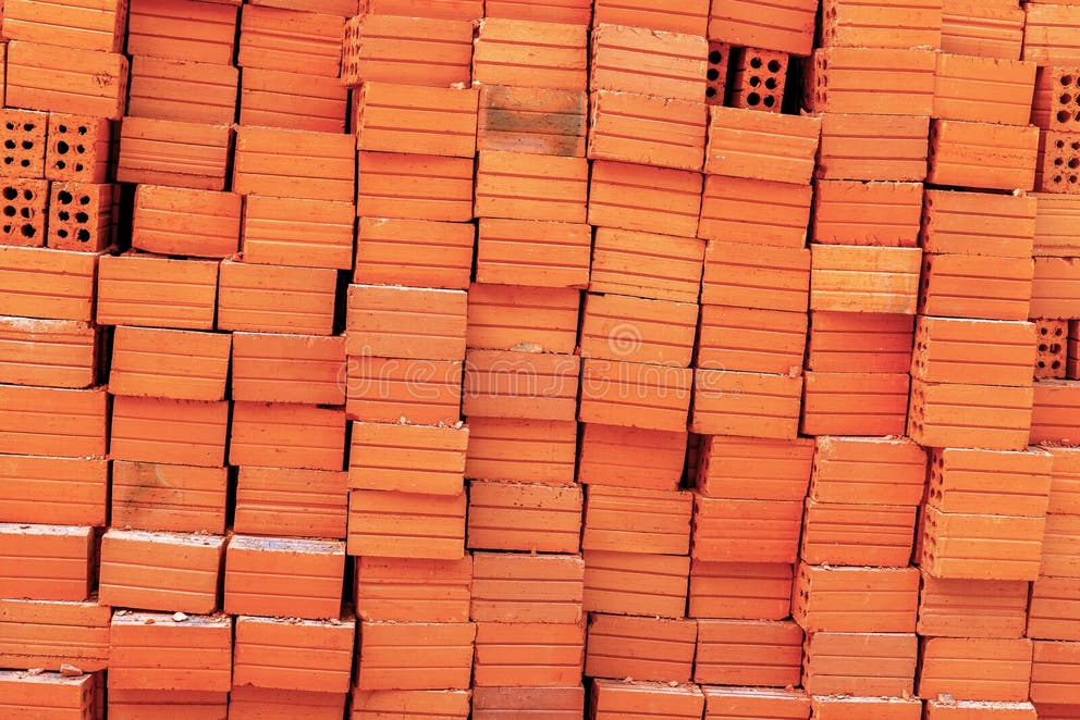 Stacked Red Clay Bricks for Construction Projects Stock Photo - Image ...