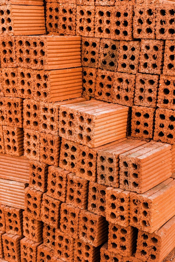 Stacked Red Clay Bricks with Hollow Pattern for Construction Stock ...