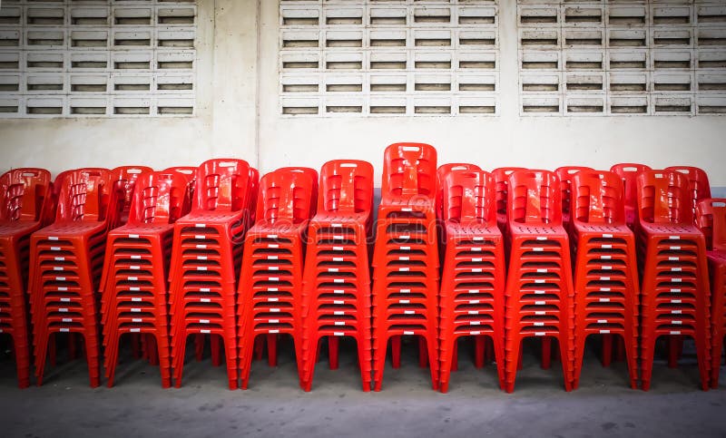 Stacked Red Plastic Chairs in Rows Stock Image - Image of pattern ...