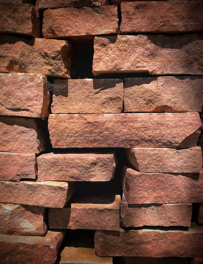 Stacked Red Sandstone wall stock photo. Image of light - 123782002