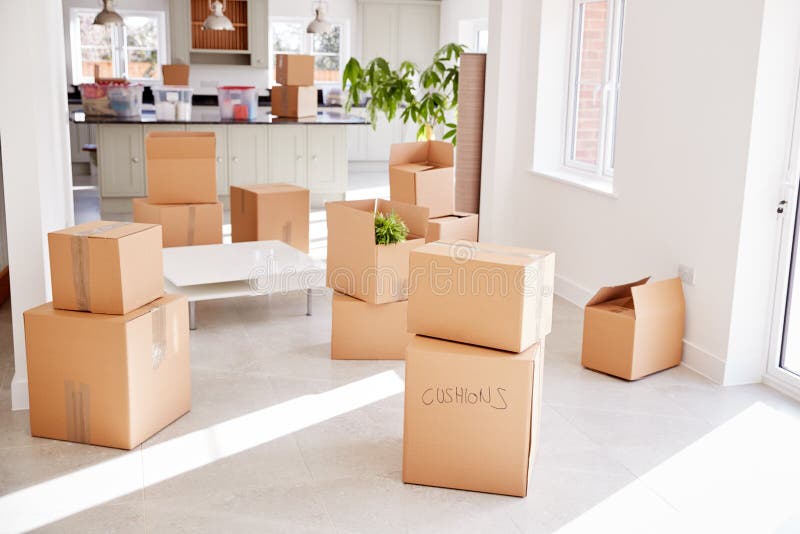 Stacked Removal Boxes in Empty Room on Moving Day Stock Photo - Image ...