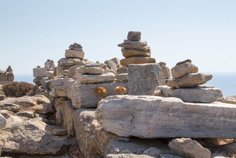 Rocks in vertical stacks stock photo. Image of achievement - 114016278