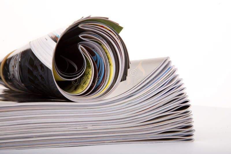 Stacked and Rolled Magazines Stock Image - Image of edges, color: 74000707