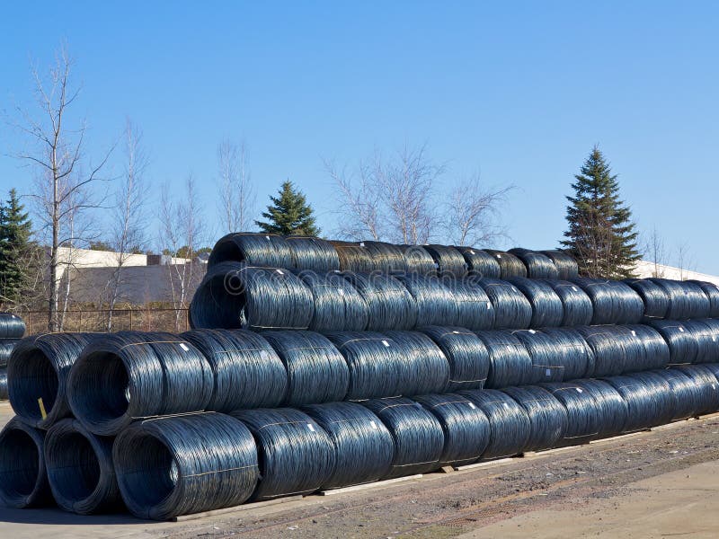 Stacked Rows of Coiled Steel Wire Stock Image - Image of shiny, cable ...