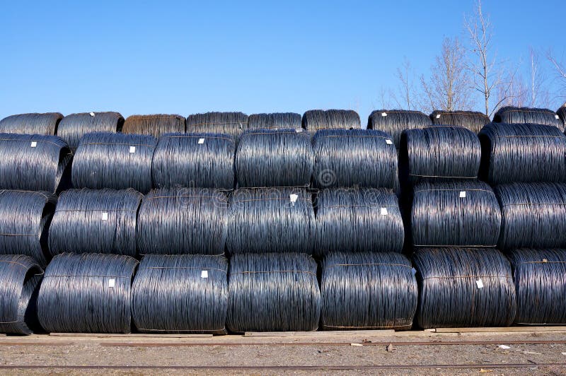Stacked Rows of Coiled Steel Wire Stock Photo - Image of outdoor, round ...